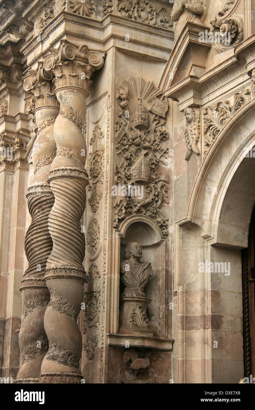 Baroque style pillars in the facade of the La Compania Church in the ...
