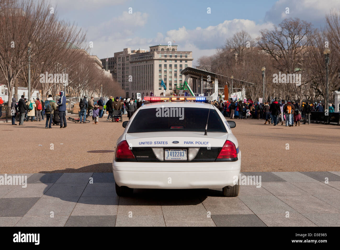 US National Park Police car behind a crowd of demonstrators ...