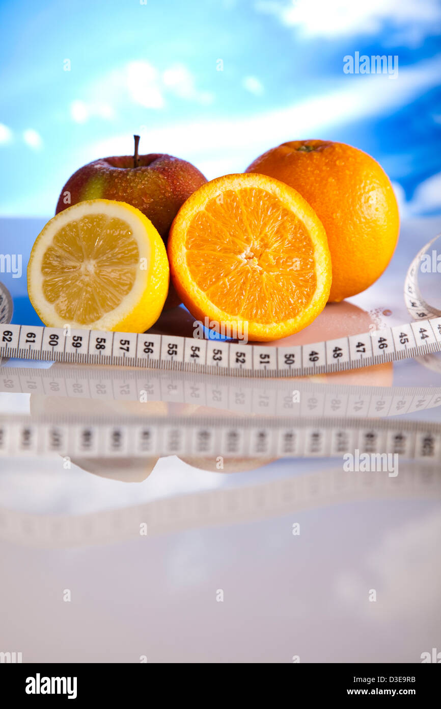 Fruits with measuring of dumbbell Stock Photo - Alamy
