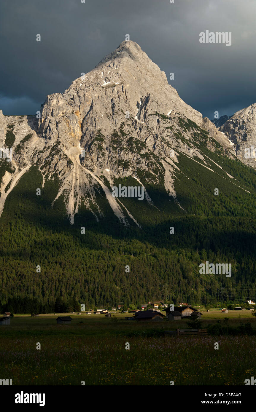 The peak Ehrwalder Sonnenspitze in the eerie light of an approaching ...