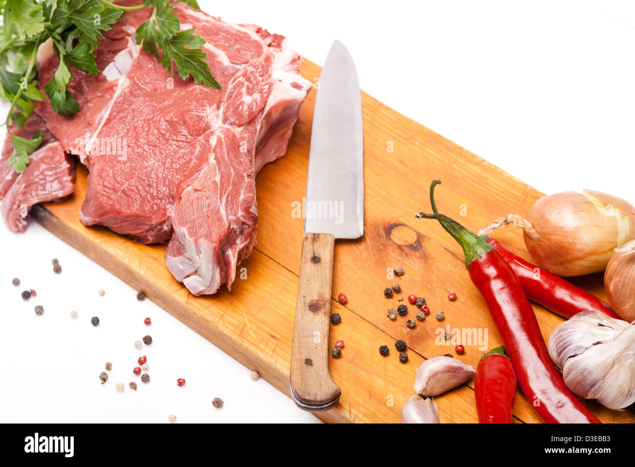 fresh meat of beef with bone on wooden with spices and knife Stock ...