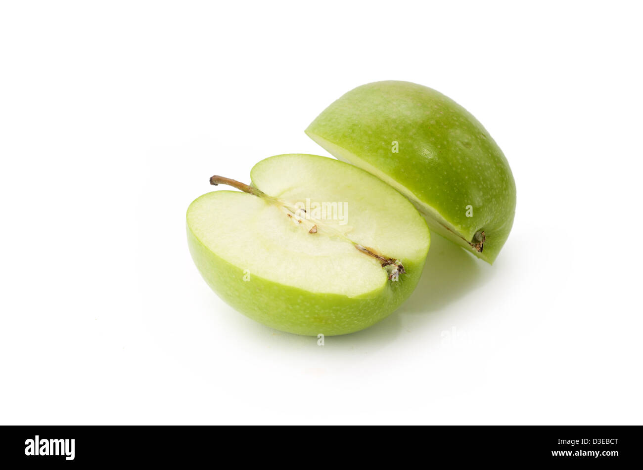 Cut Green Apple in White background Stock Photo - Alamy