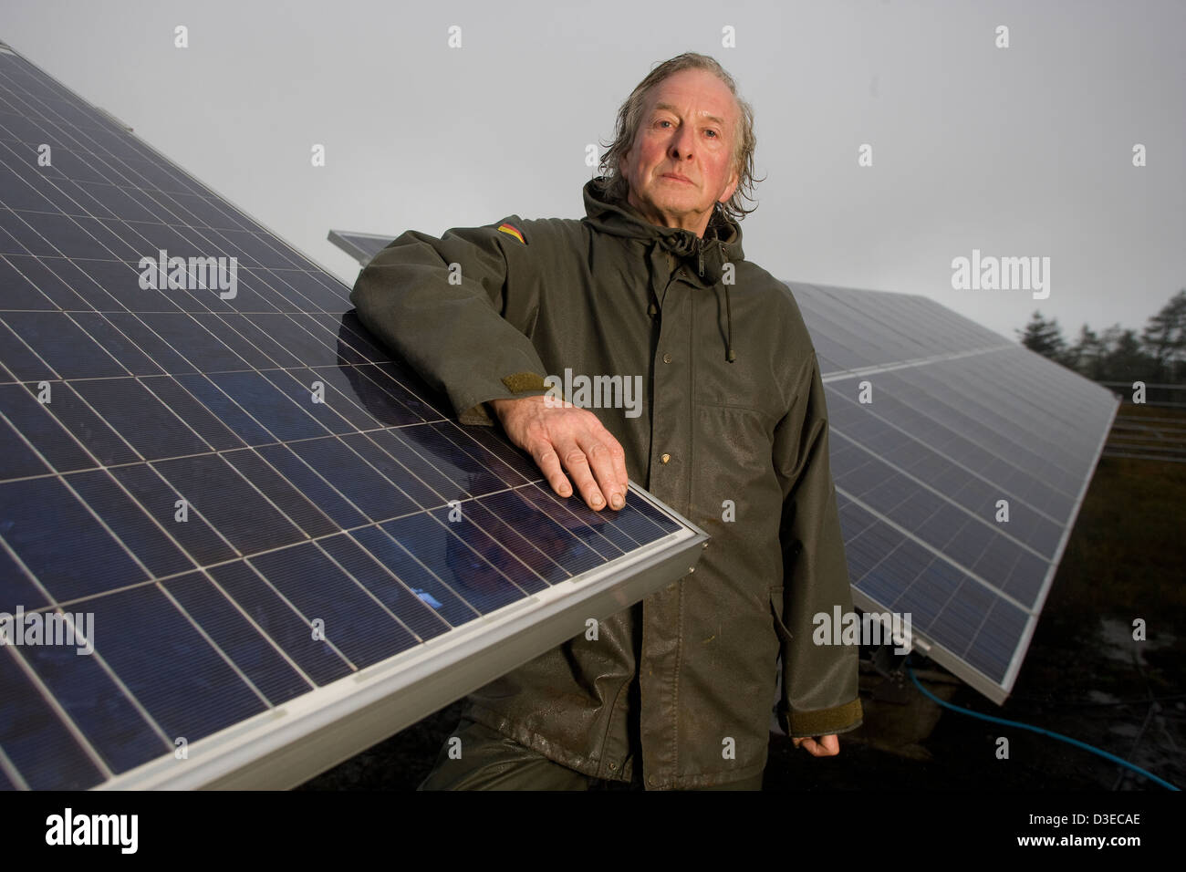 ISLAND OF EIGG, SCOTLAND - 1st NOVEMBER 2007: John Booth stands between ...