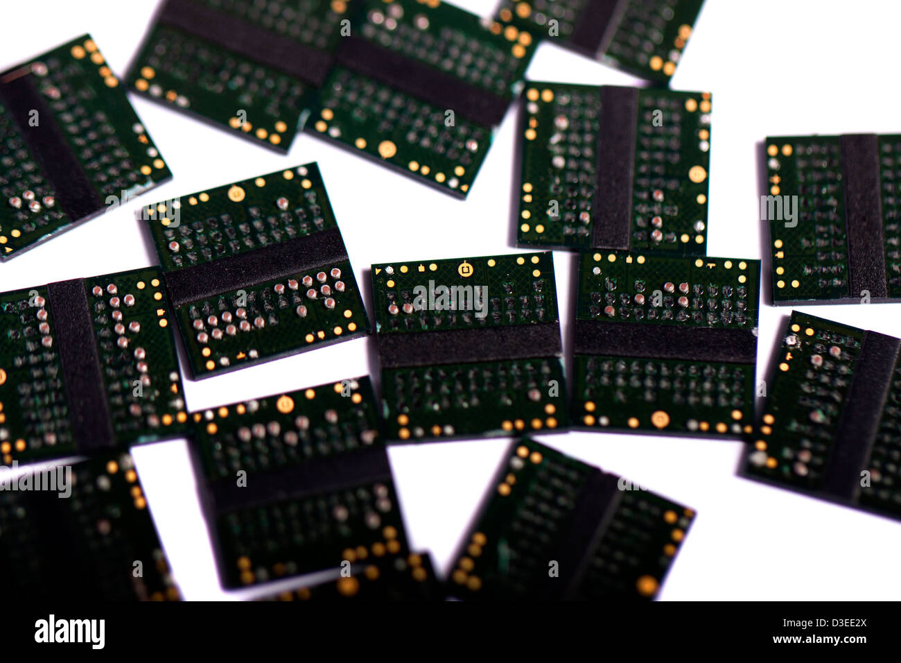 Close view of a bunch of computer memory chips isolated on a white ...