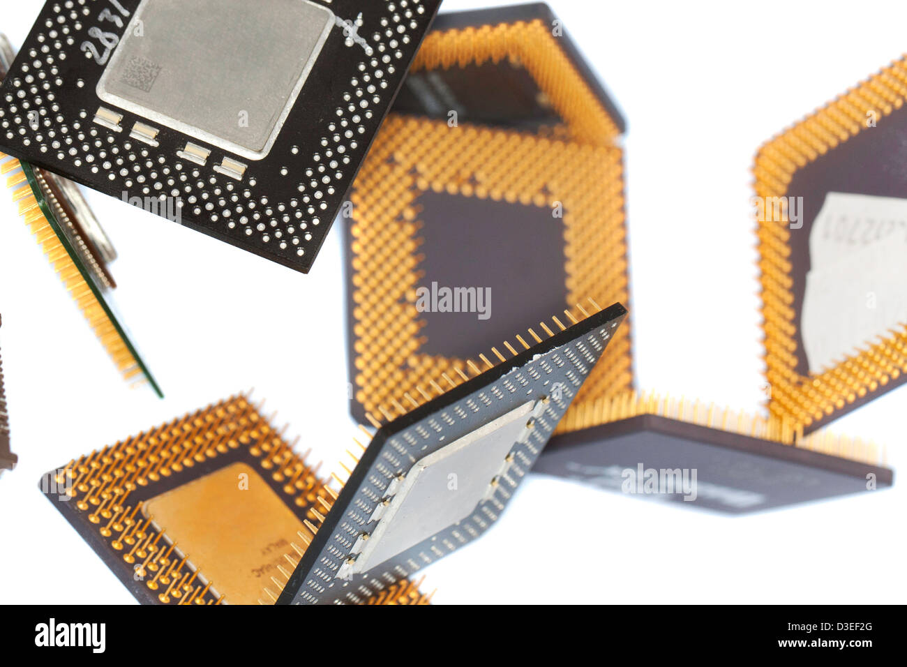 Close view detail of some computer microprocessors isolated on a white ...