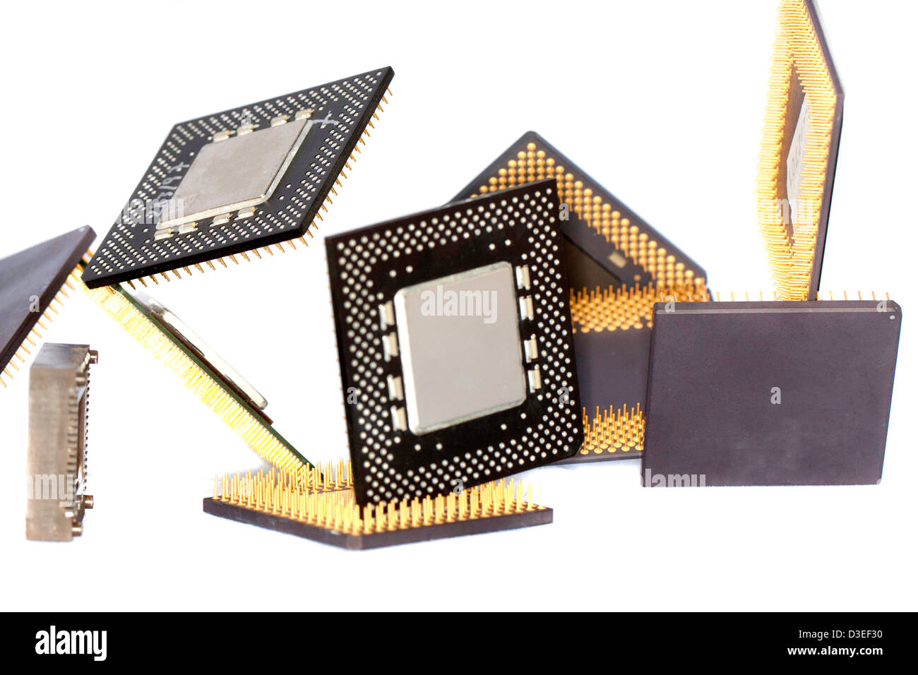 Close view detail of some computer microprocessors isolated on a white ...