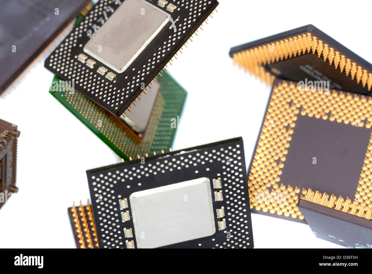 Close view detail of some computer microprocessors isolated on a white ...