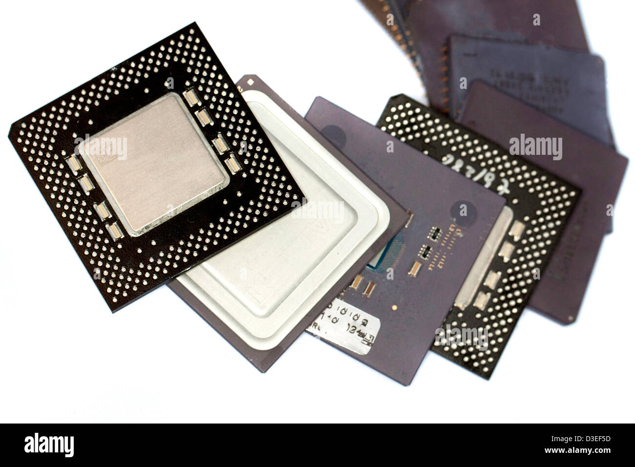 Close view detail of some computer microprocessors isolated on a white ...