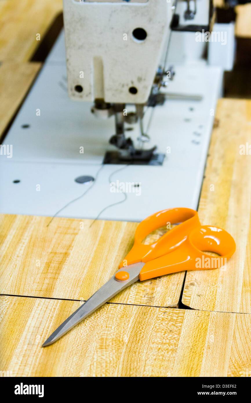 Sewing machine in tailor shop Stock Photo - Alamy