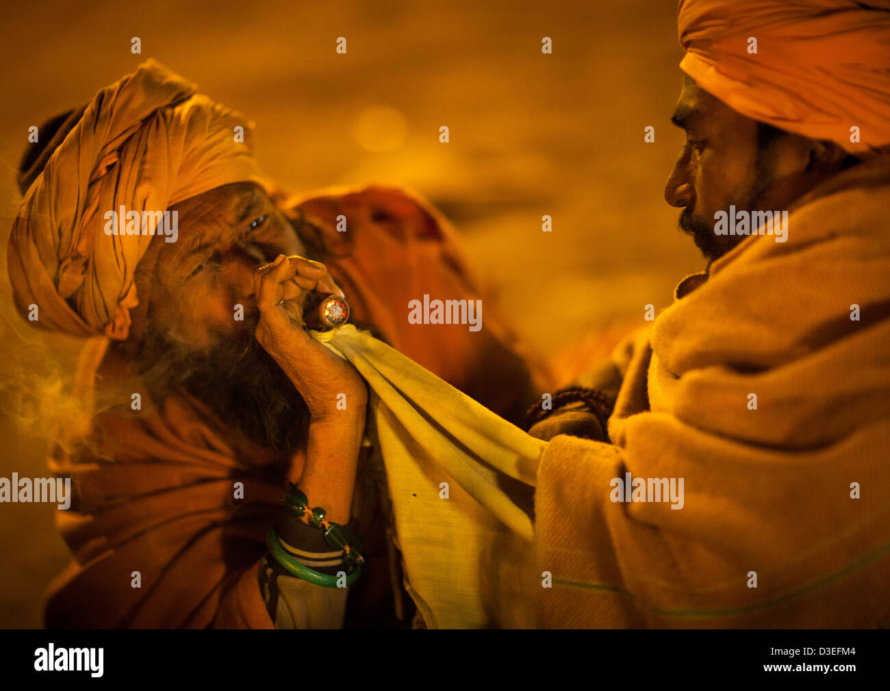 A Naga Sadhu Smoking Pot, Maha Kumbh Mela, Allahabad, India Stock Photo ...