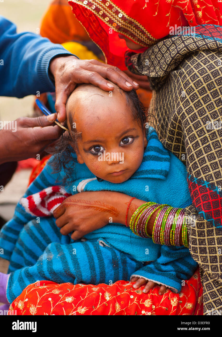 Kid Having His Hair Shaved, Maha Kumbh Mela, Allahabad, India Stock ...
