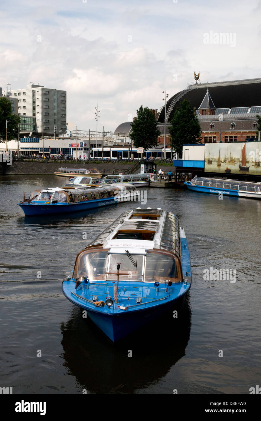 tourist canal boats,amsterdam central station,netherlands Stock Photo ...