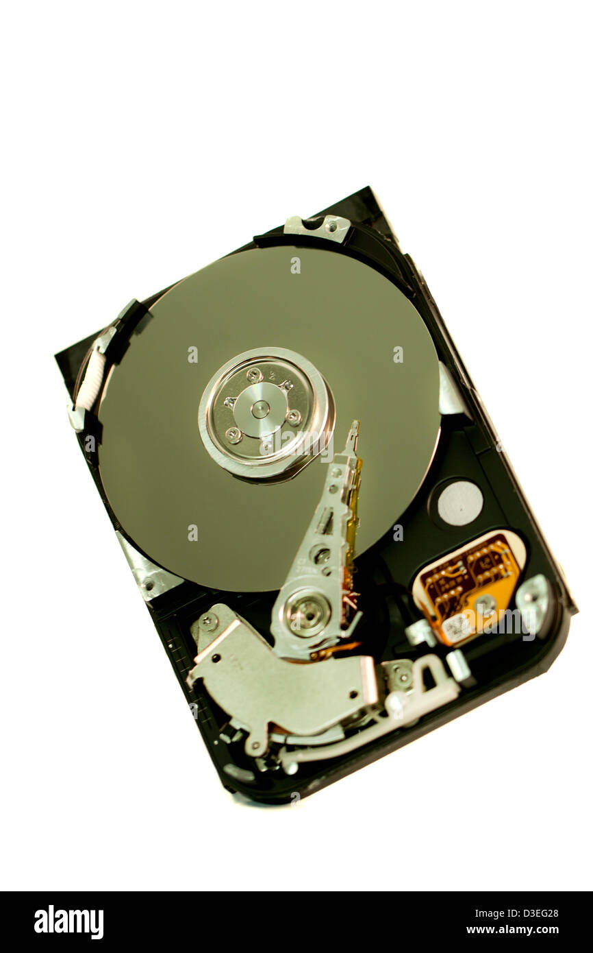 close view detail of the inside of a computer harddisk isolated on a ...