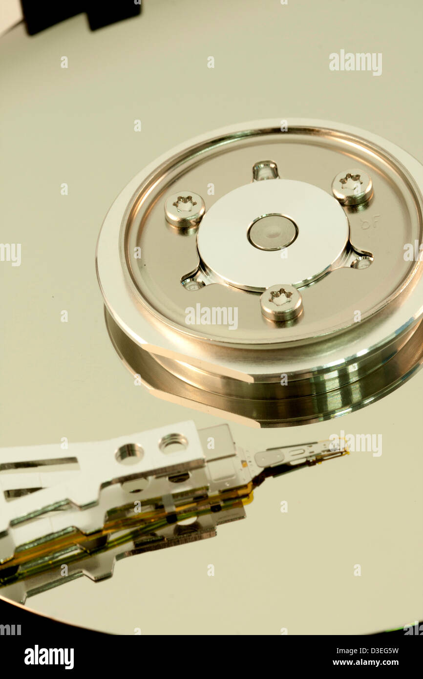 close view detail of the inside of a computer harddisk isolated on a ...