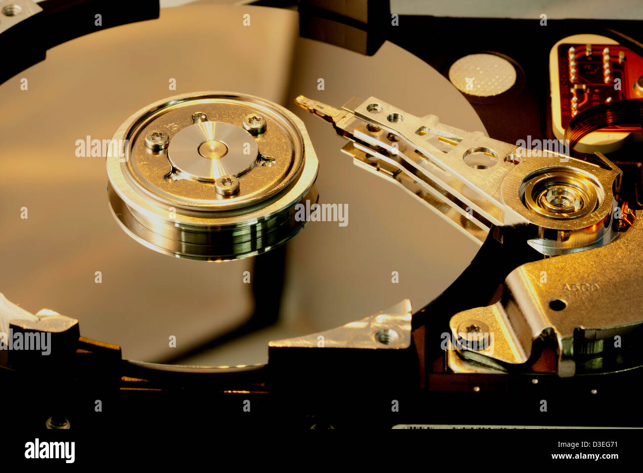 close view detail of the inside of a computer harddisk isolated on a ...