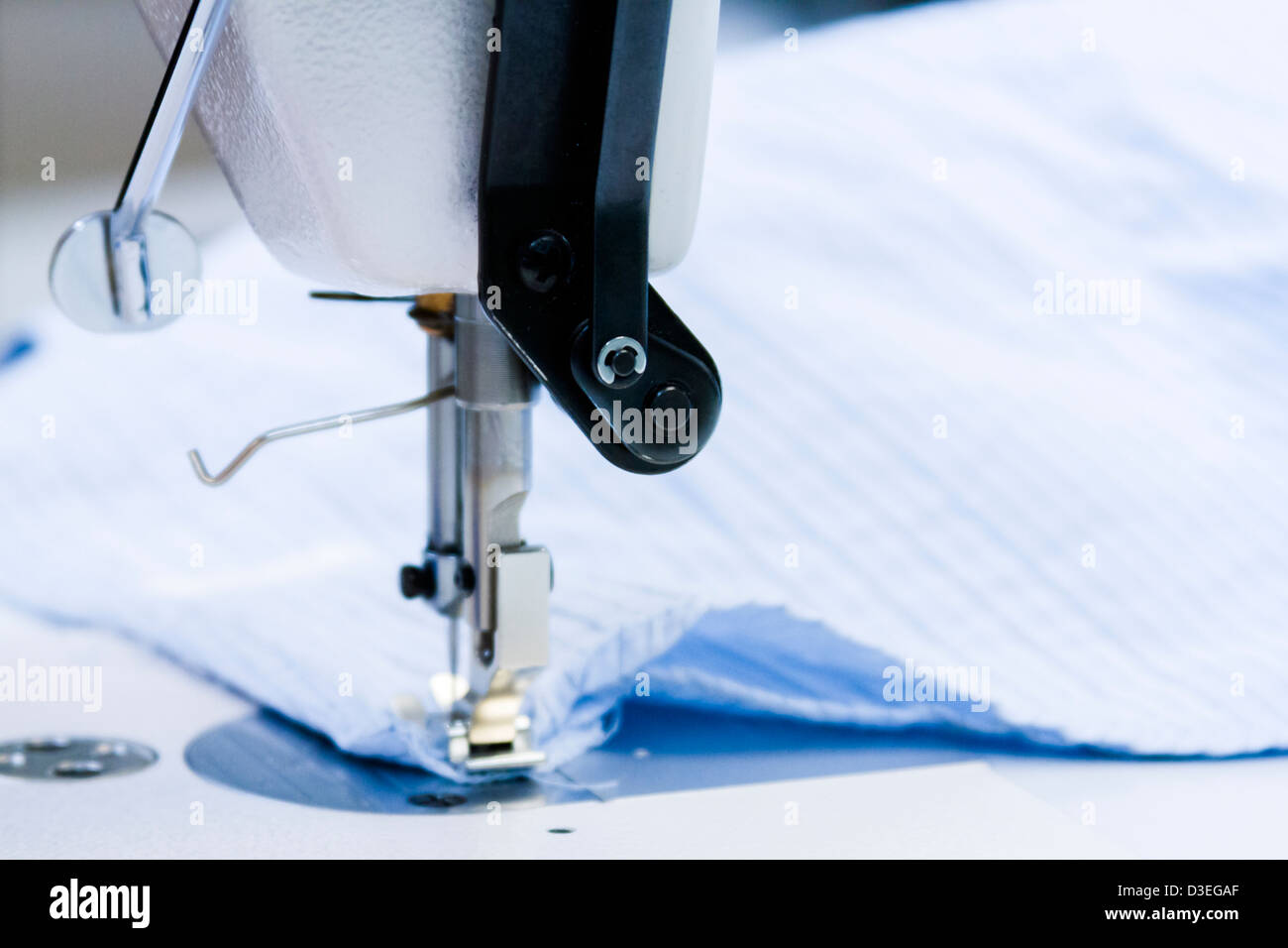 Sewing machine in tailor shop Stock Photo - Alamy