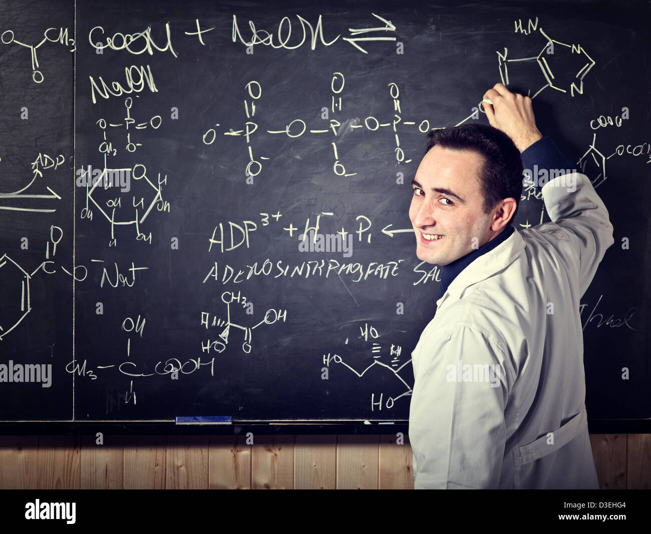 portrait of teacher with blackboard background Stock Photo - Alamy