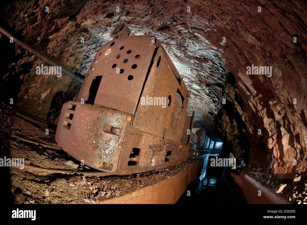 An old train inside an abandoned mine of iron and copper. Val Graveglia ...
