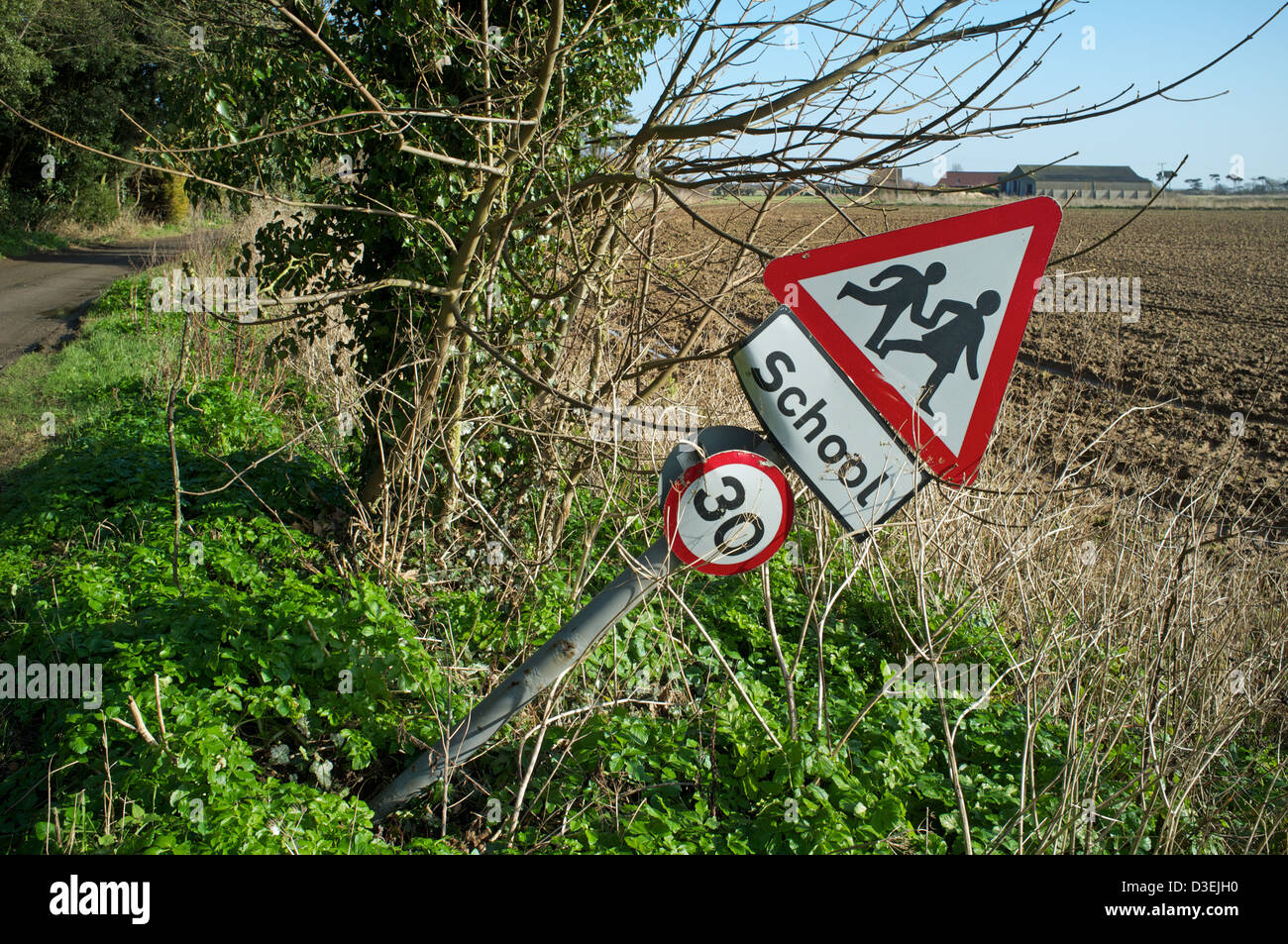 Damaged school sign Stock Photo - Alamy