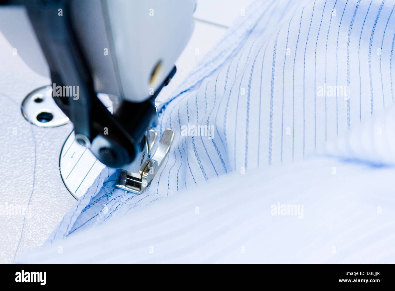 Sewing machine in tailor shop Stock Photo - Alamy