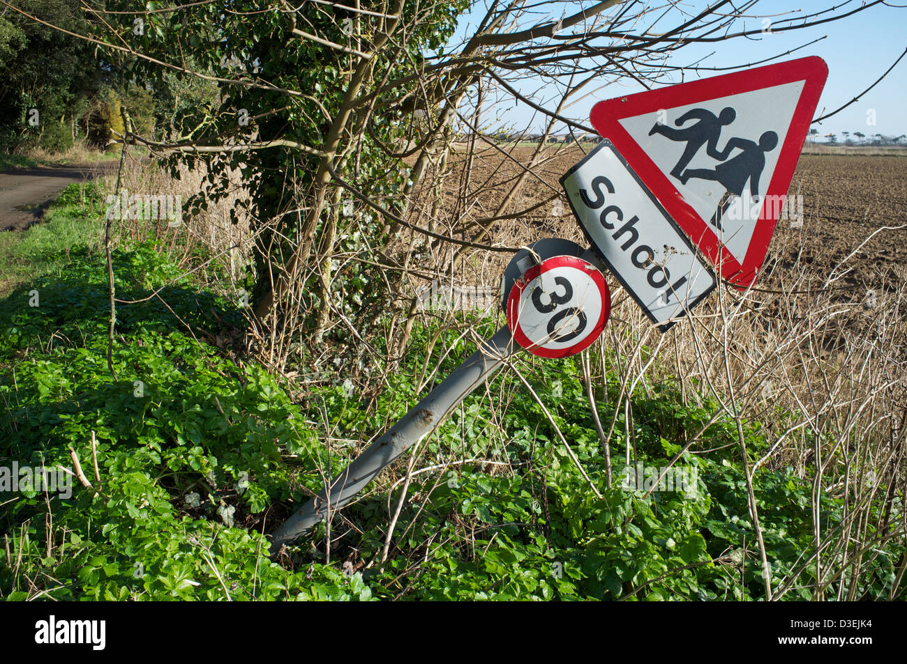 Damaged school sign Stock Photo - Alamy