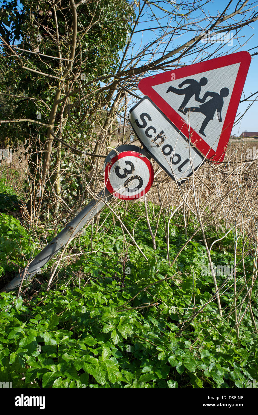 Damaged school sign Stock Photo - Alamy