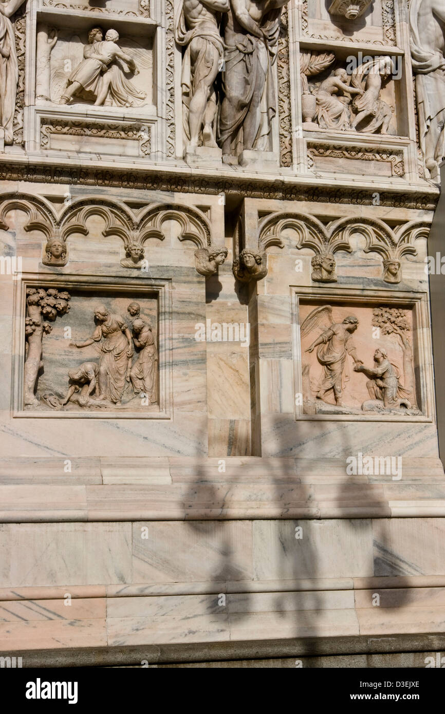 Decorative stonework ornate carvings and lamp shadow Milan cathedral ...
