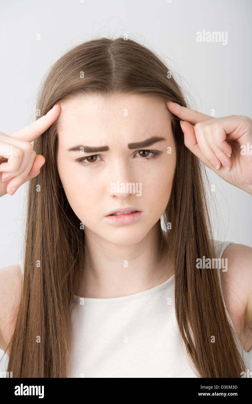 Teenage girl looking frustrated Stock Photo - Alamy