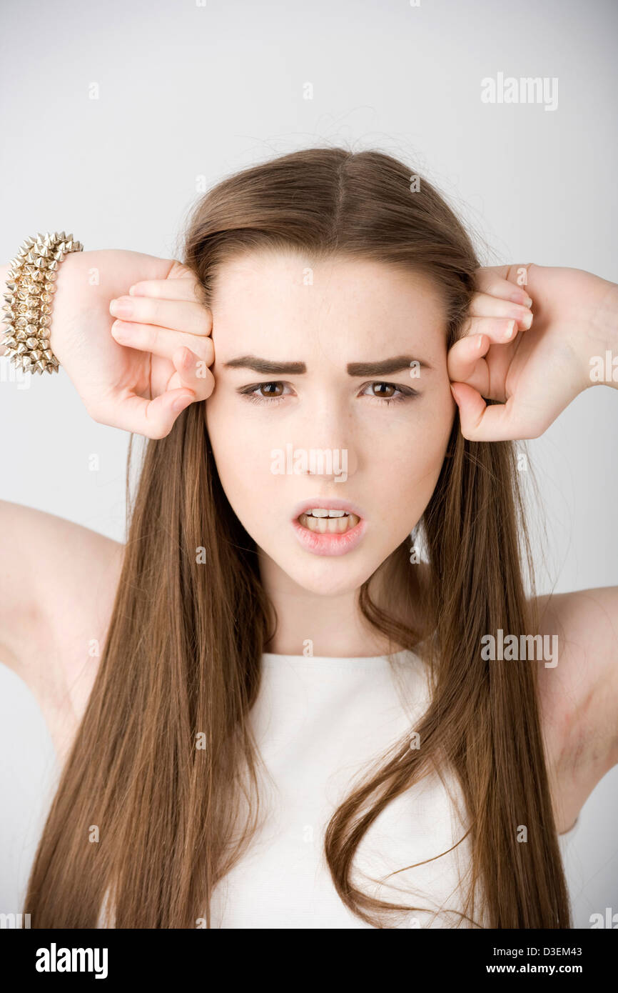Teenage girl showing signs of frustration / stress Stock Photo - Alamy