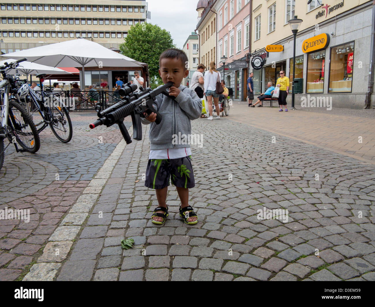 Boy with rifle hi-res stock photography and images - Alamy