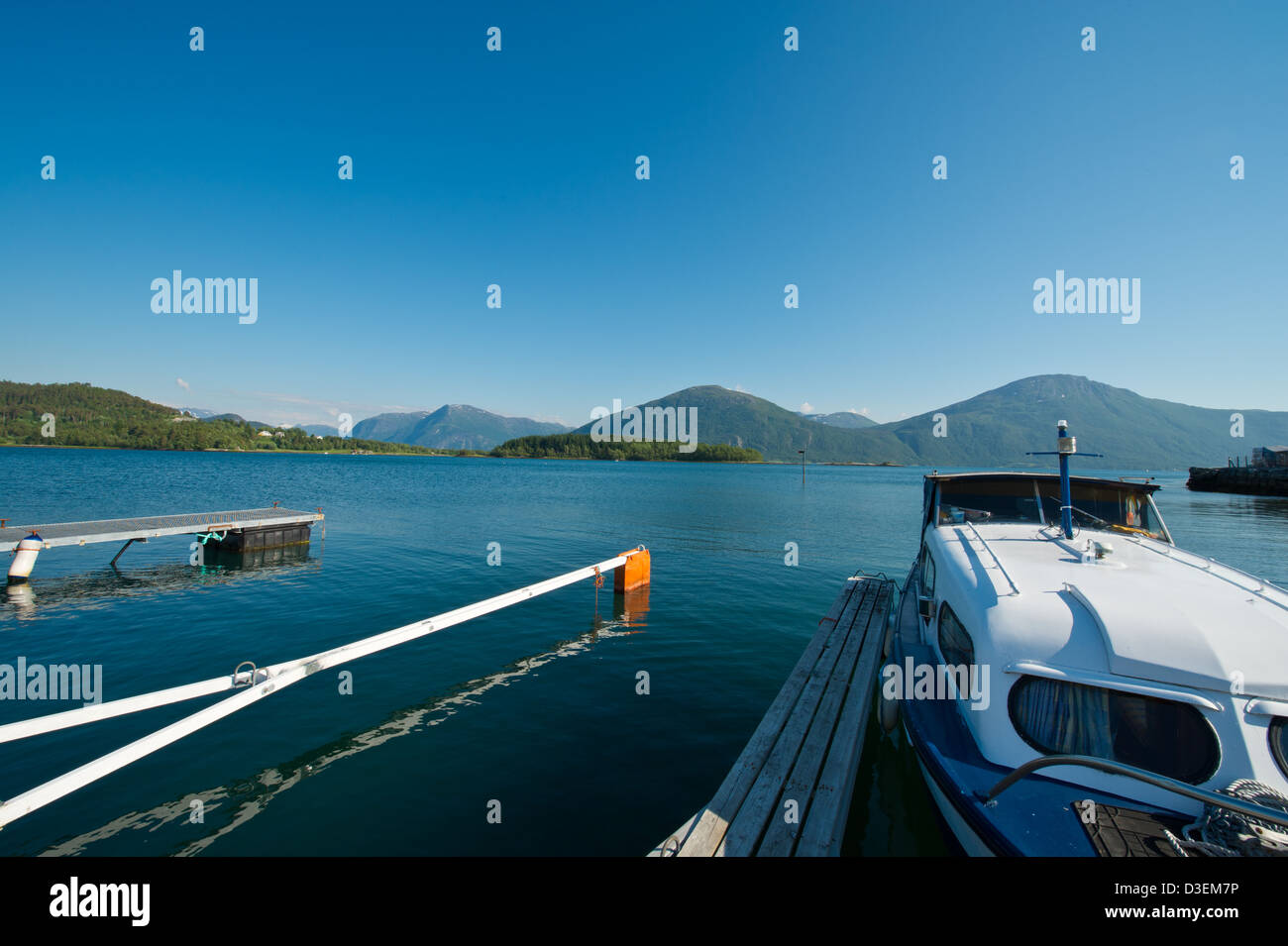 Landscape Norwegian lake with a dock for boats Stock Photo - Alamy