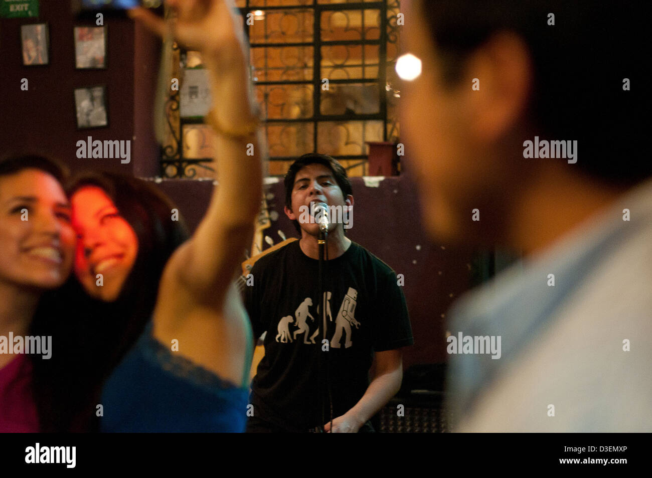 Peru, Lima, Barranco, nightlife.People in an evening at El Circulo, pub ...