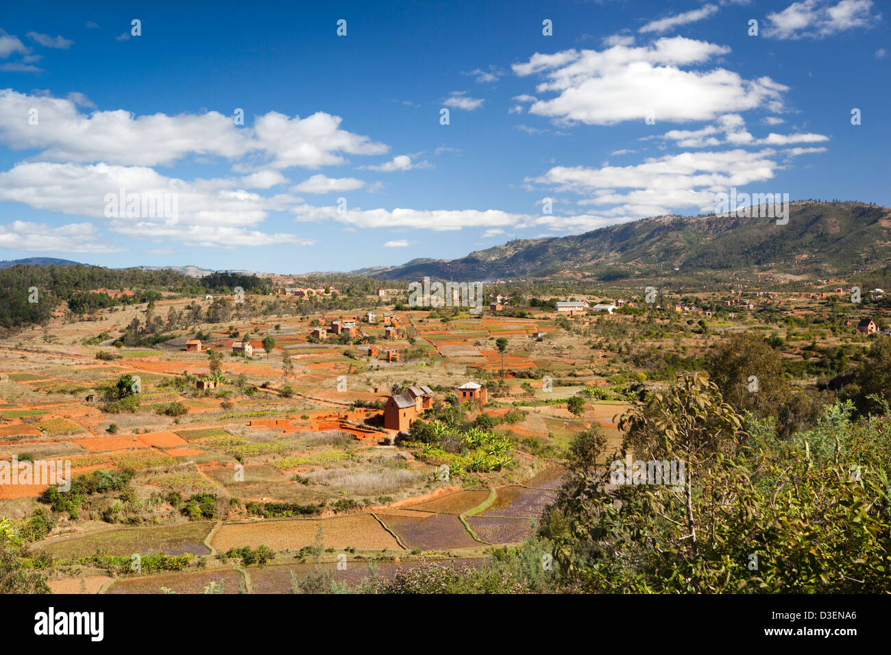 Madagascar, Ambositra, village of red ochre rendered houses amongst ...