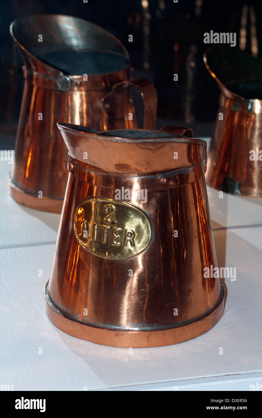 antique brass measuring cup Stock Photo - Alamy