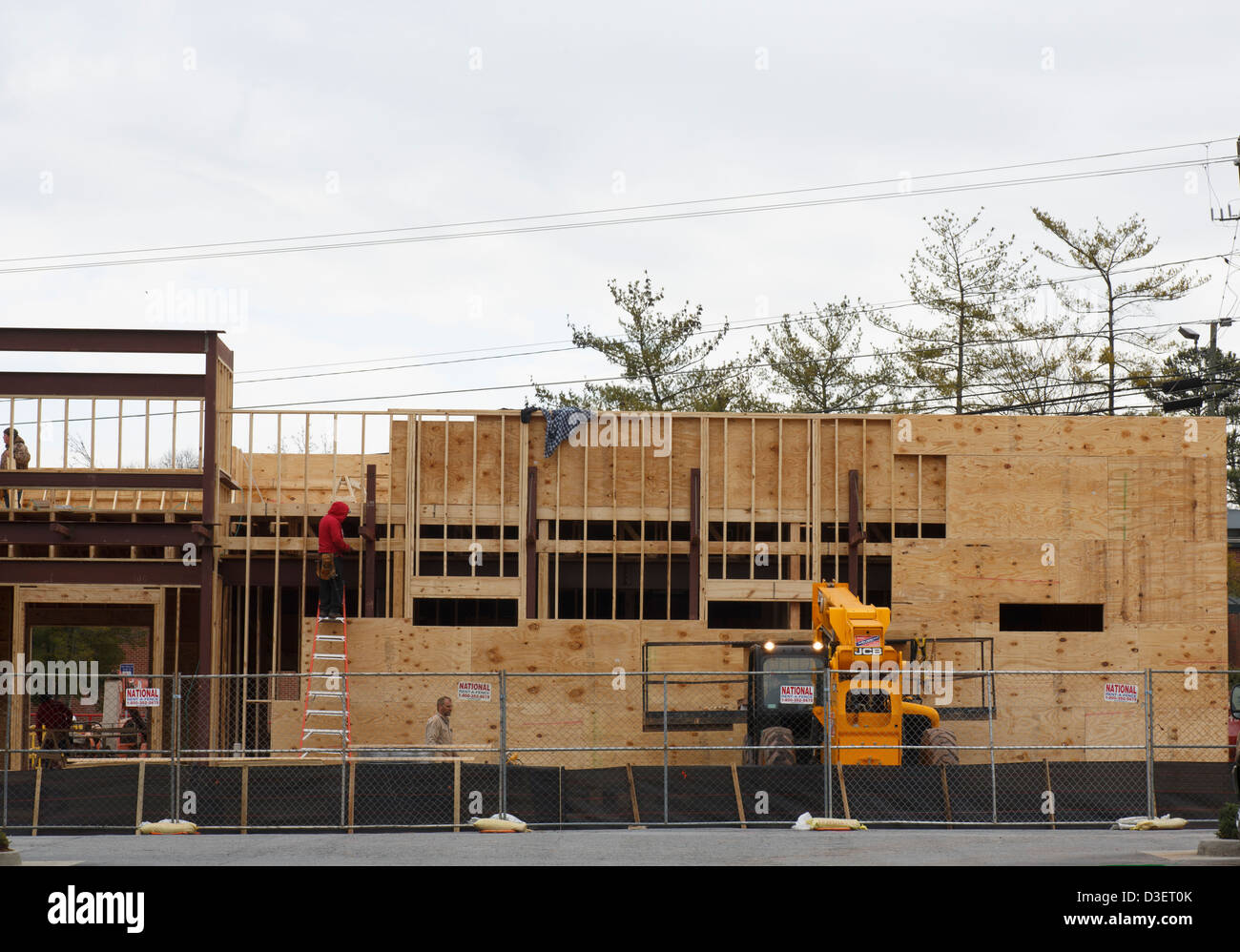 Construction on a fast food restaurant under cloudy winter skies Stock ...