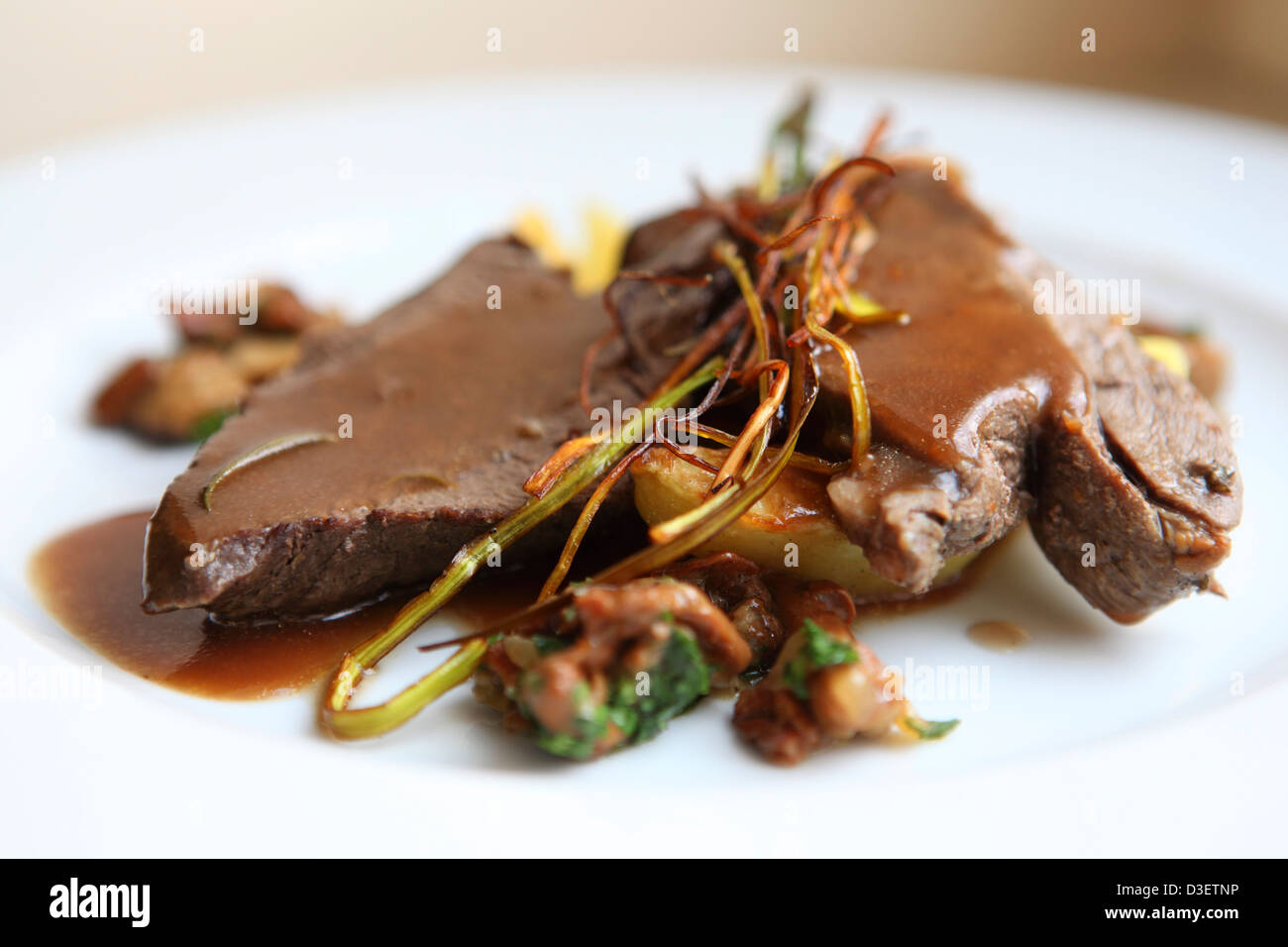 Venison steak is served for lunch at Sierakow Manor House in the ...