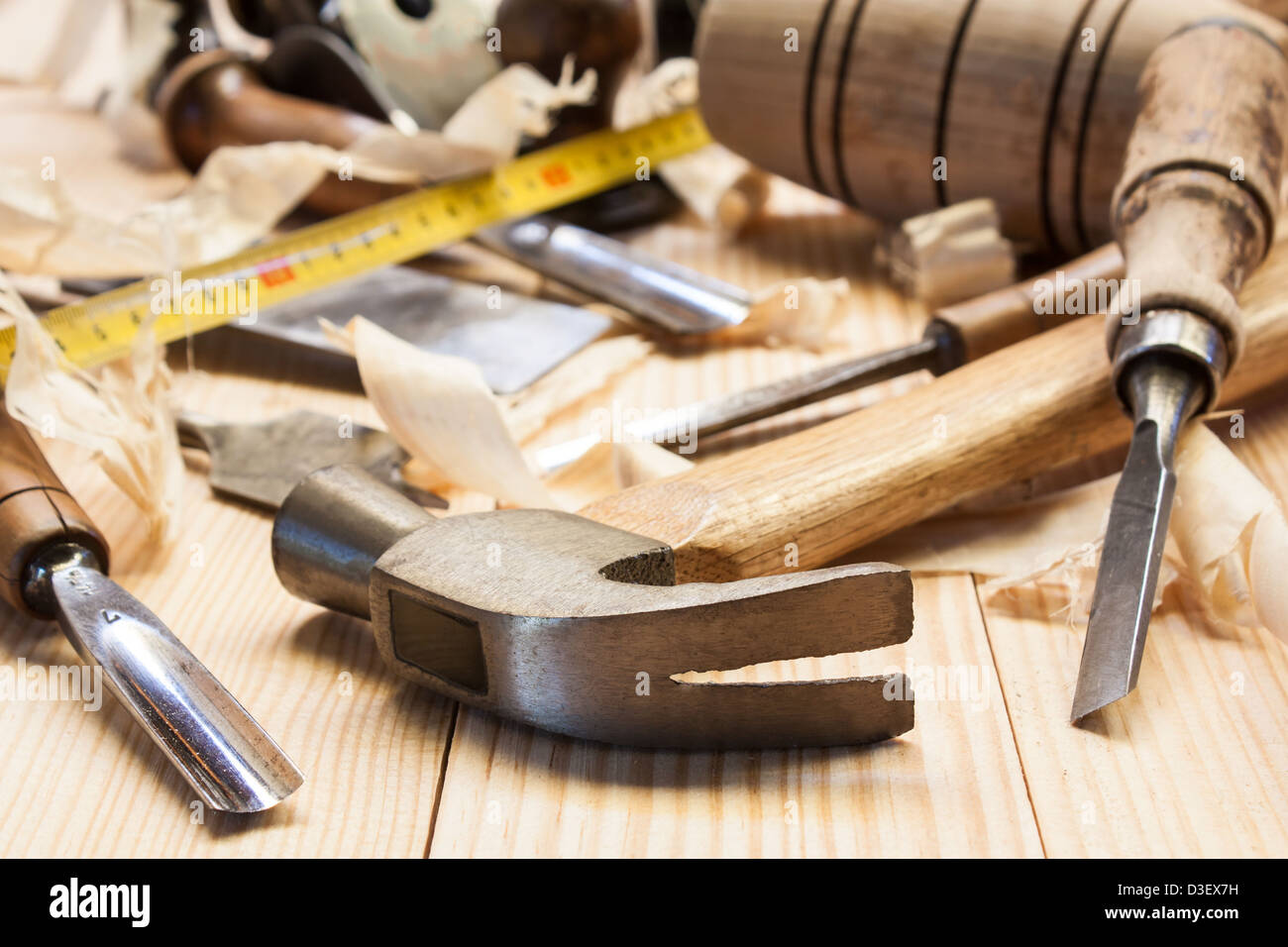 carpenter tools in pine wood table Stock Photo - Alamy