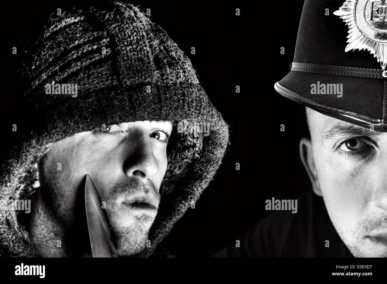 criminal and a police officer on a black background Stock Photo - Alamy
