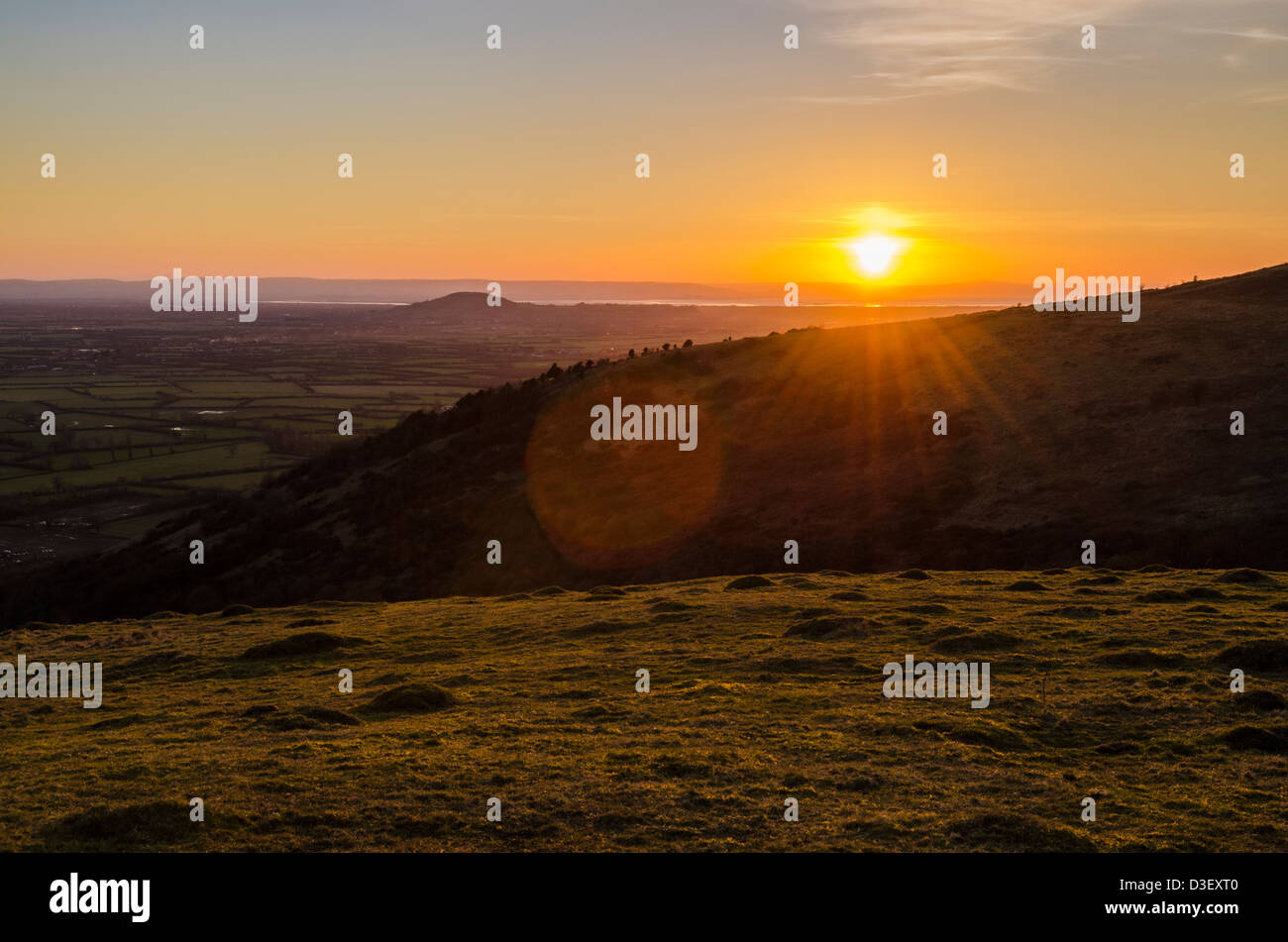 Winter sunset viewed from Cross Plain over Wavering Down on the Mendip ...