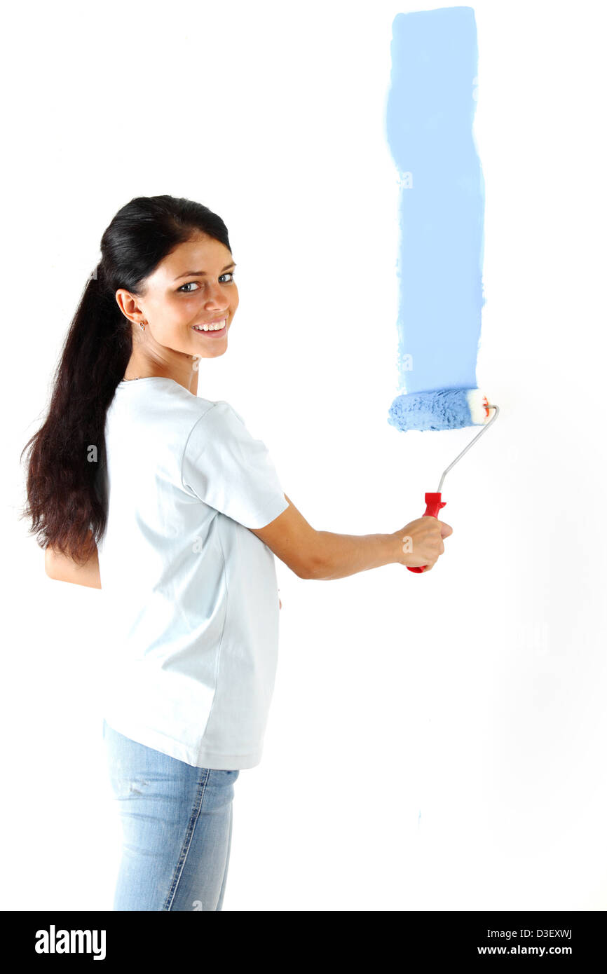 roller in woman hand paint on the wall Stock Photo - Alamy
