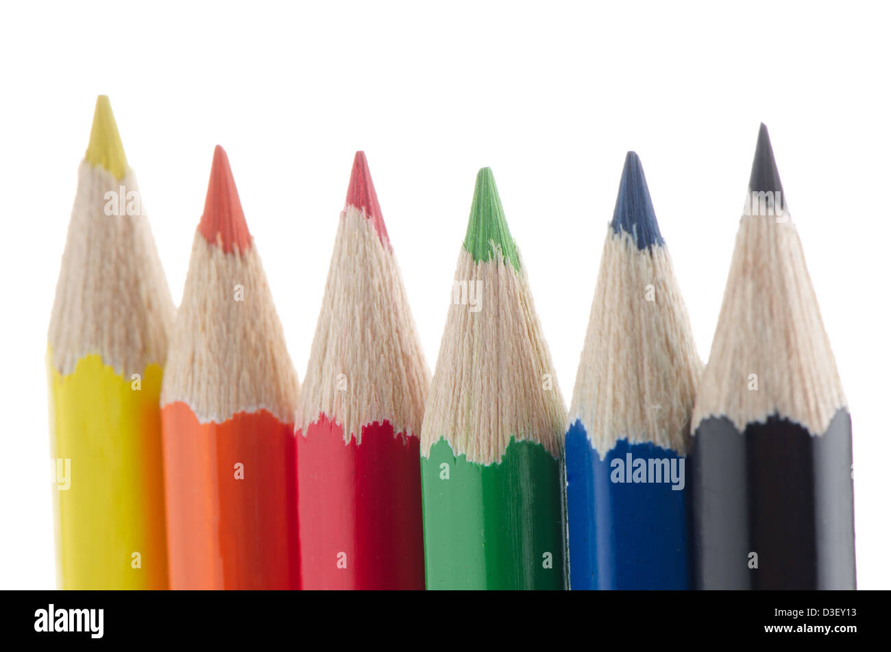 Close up of color pencils with different color over white background ...