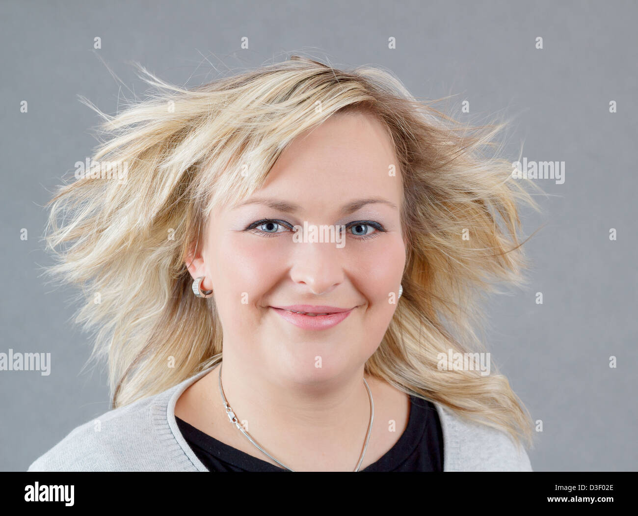 Portrait of cute smiling relaxing plump woman Stock Photo - Alamy