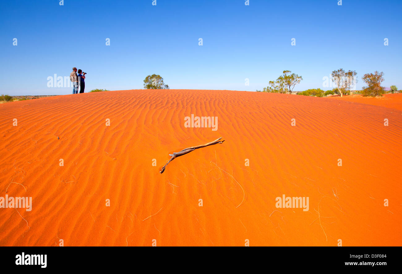 Two tourists taking in the sights in Central Australia Northern ...