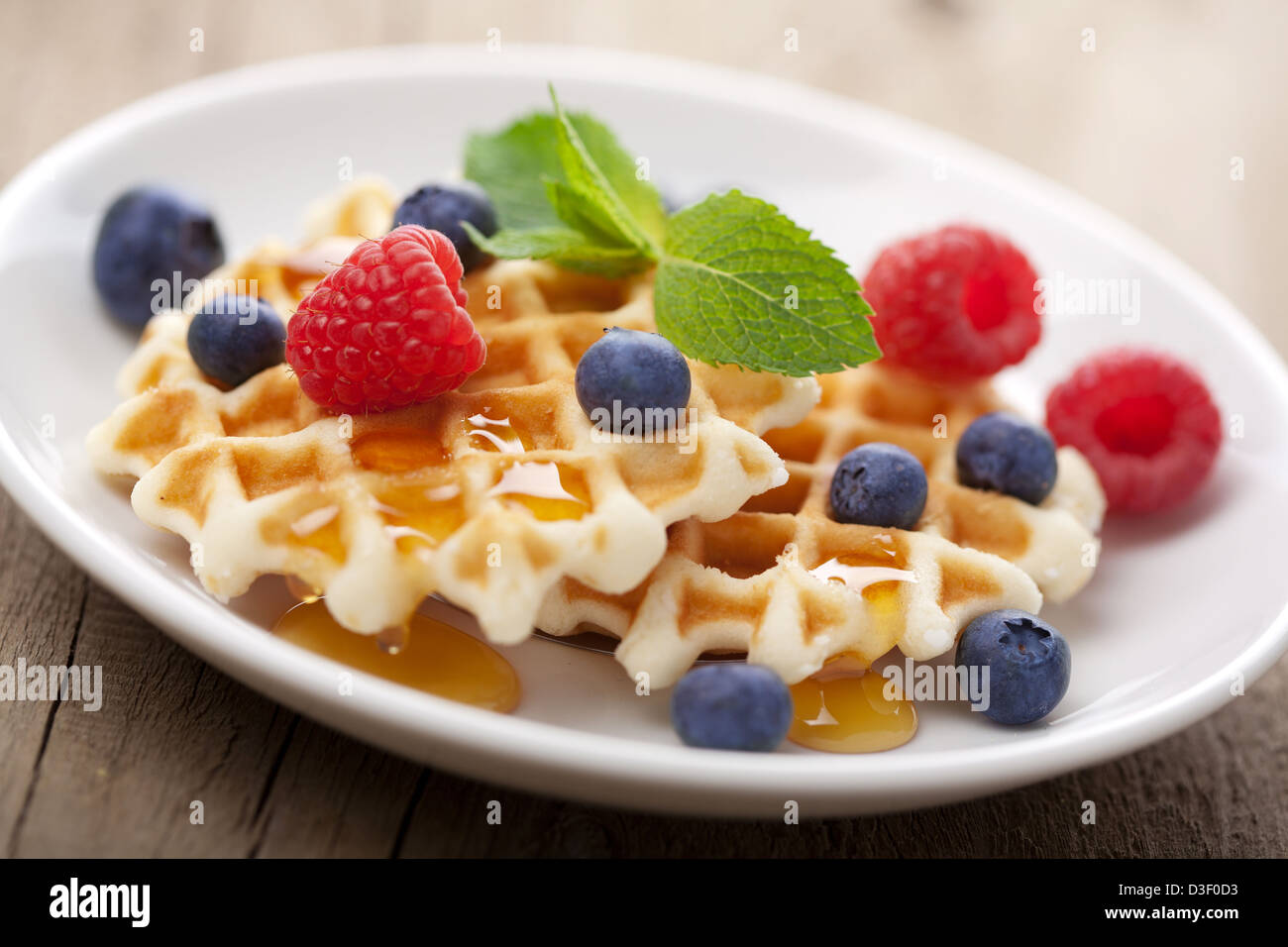 Closeup waffles honey syrup hi-res stock photography and images - Alamy