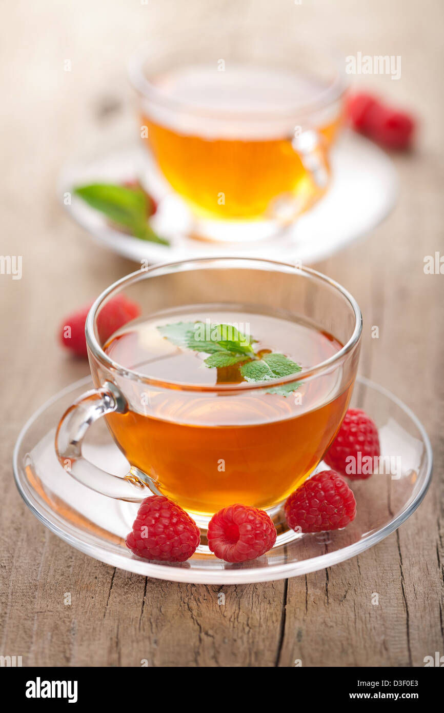 tea with mint and raspberry Stock Photo - Alamy