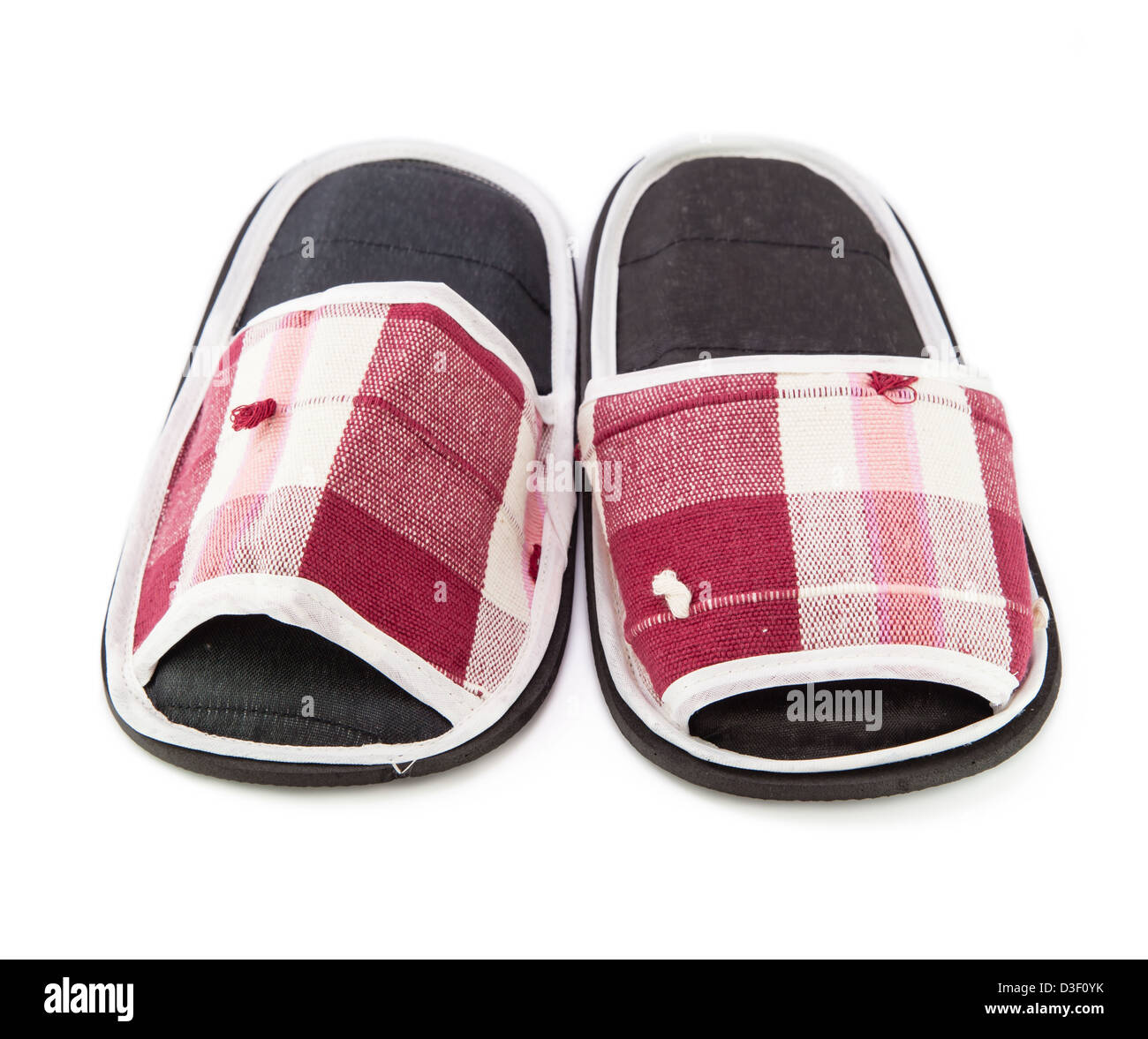 A pair of red slippers isolated on white background Stock Photo - Alamy