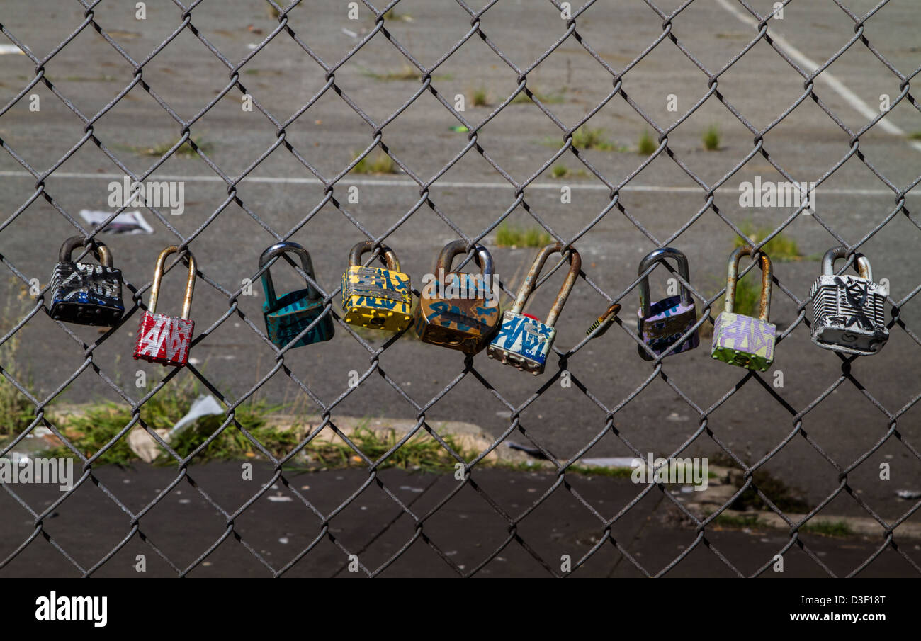 Multiple locks on fence hi-res stock photography and images - Alamy