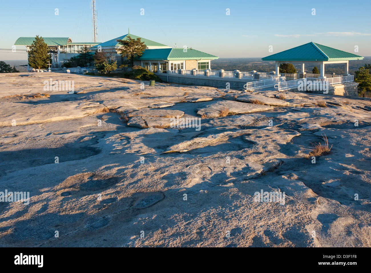 Sunset view of Visitor Center, lookout and cable car dock atop Stone ...