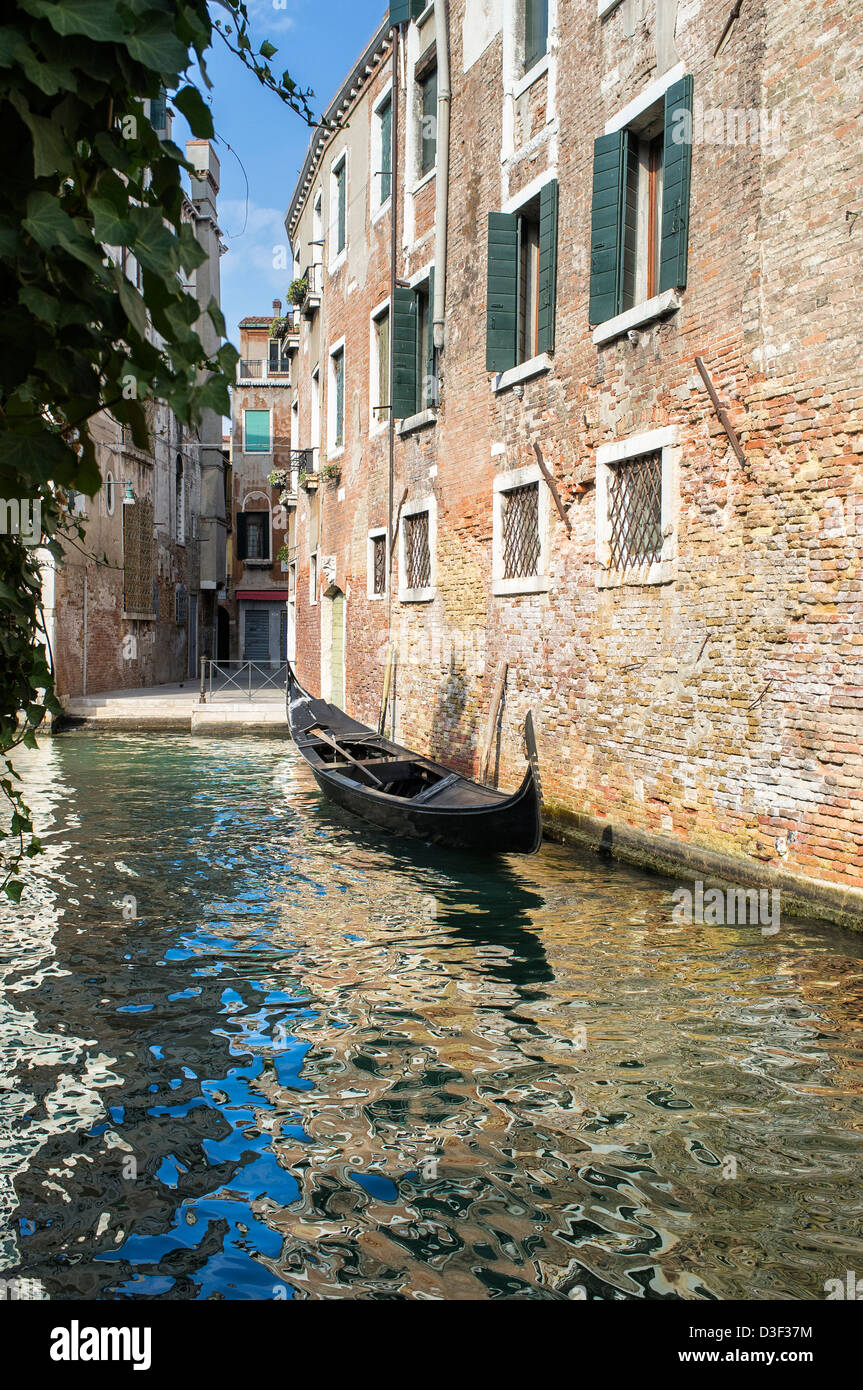 Gondola and reflections in a canal hi-res stock photography and images ...