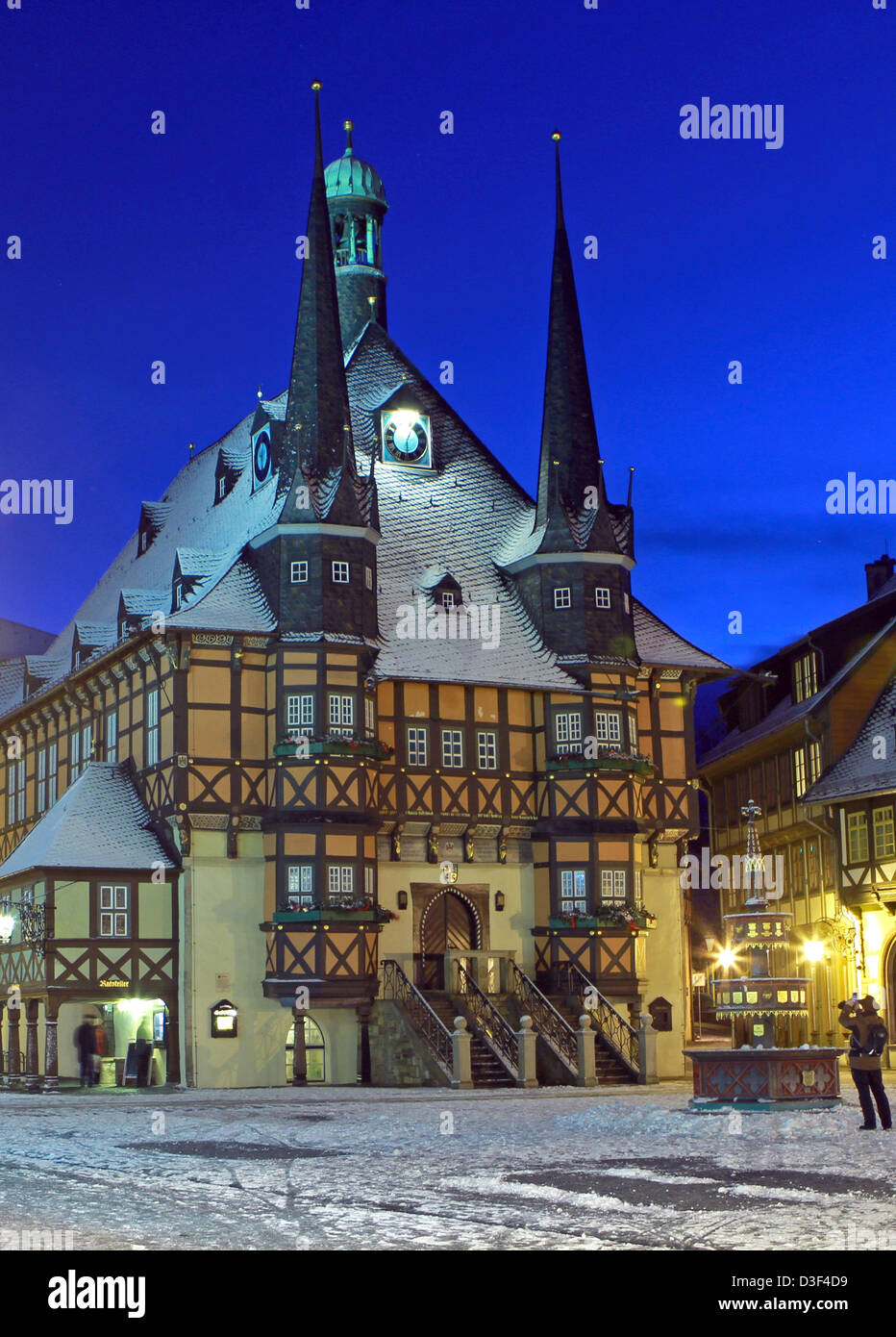 Snow covers the square in front of the historic town hall in ...